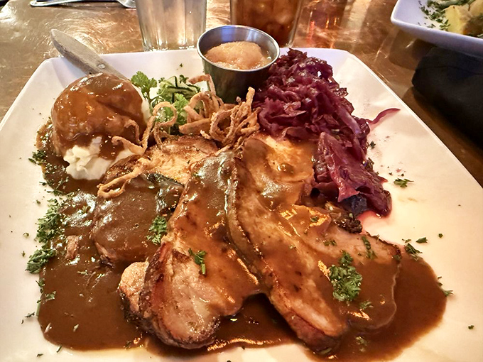 Roast pork swimming in rich brown sauce – this is what Sunday dinner dreams are made of.