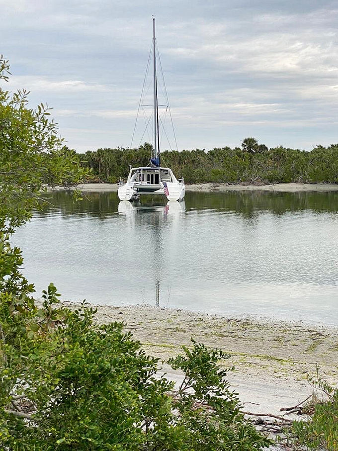 Sailing into serenity. This catamaran found the perfect anchorage in the calm waters near Stump Pass, where time seems to stand wonderfully still.