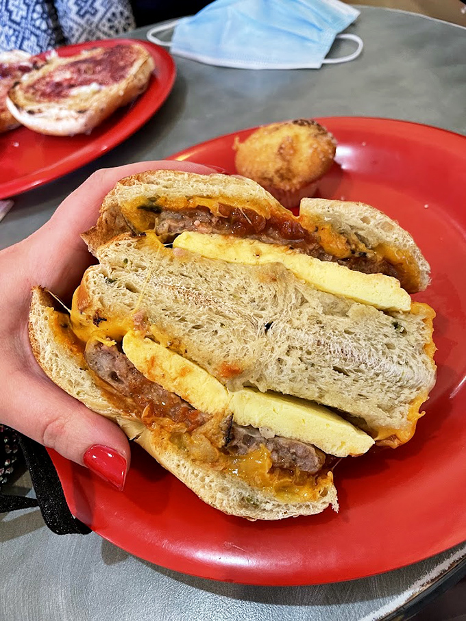 This breakfast sandwich isn't just food&mdash;it's architectural genius with layers of egg, cheese, and meat creating the perfect morning foundation.