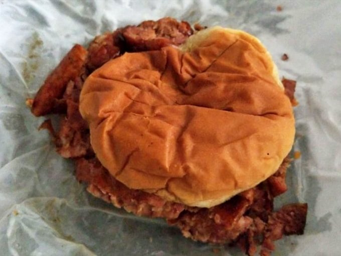 When the sandwich bun becomes merely a delivery vehicle for a mountain of smoky meat, you know you're in the right place.