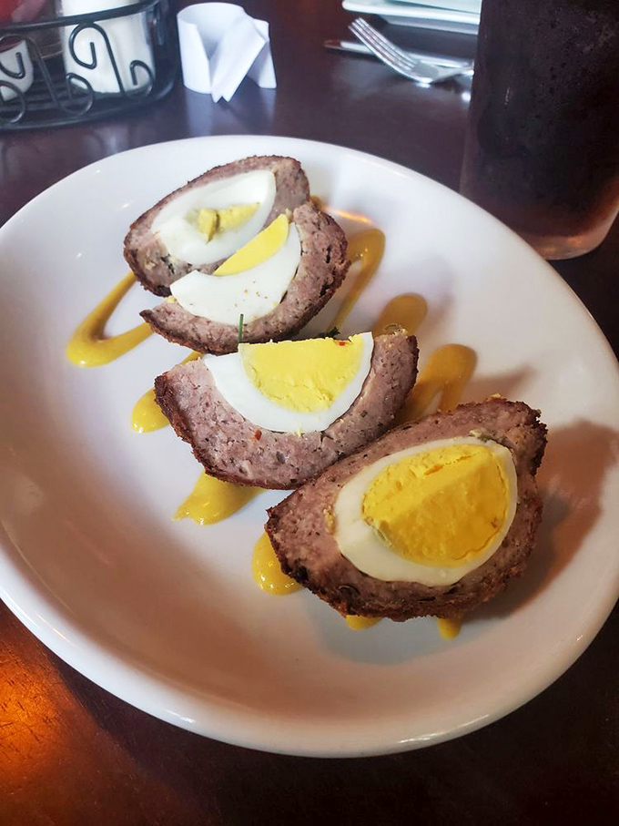 Scotch Eggs: the breakfast, lunch, and dinner of champions. A perfect protein package that proves British cuisine isn't just about boiling things. 