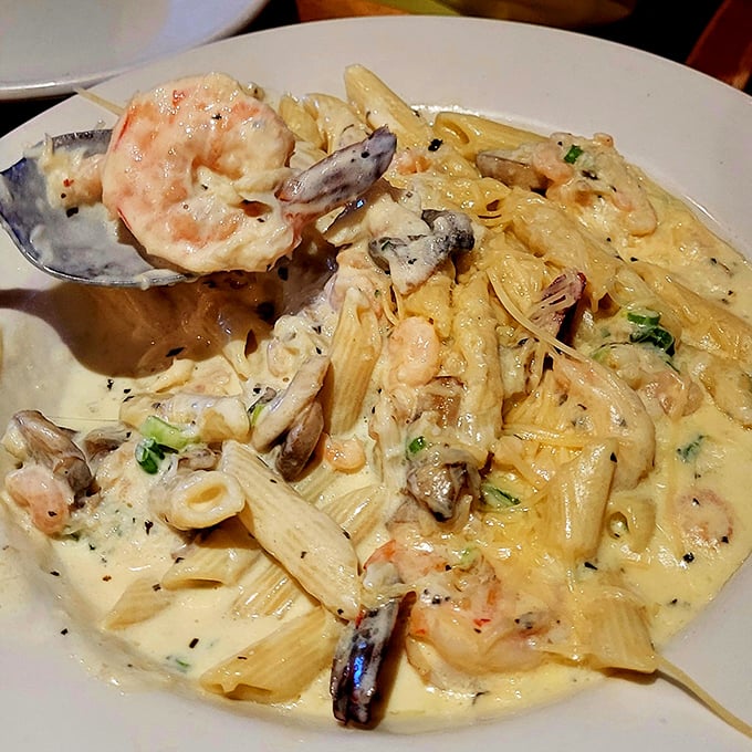 Seafood pasta that makes you wonder why anyone would waste penne on anything else but ocean treasures.
