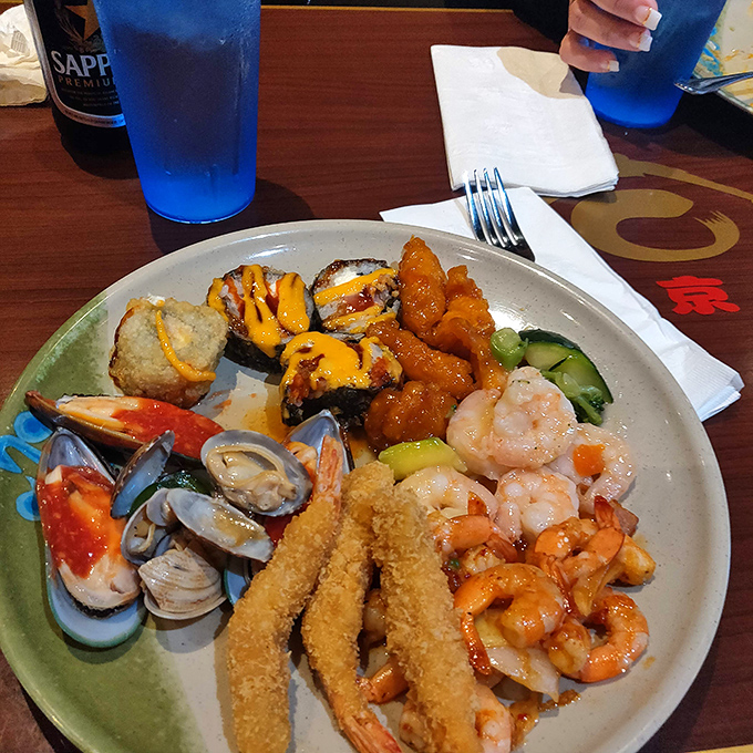 A plate that answers the eternal question: "Why choose one seafood when you can have them all?" The answer is always "Yes, please."