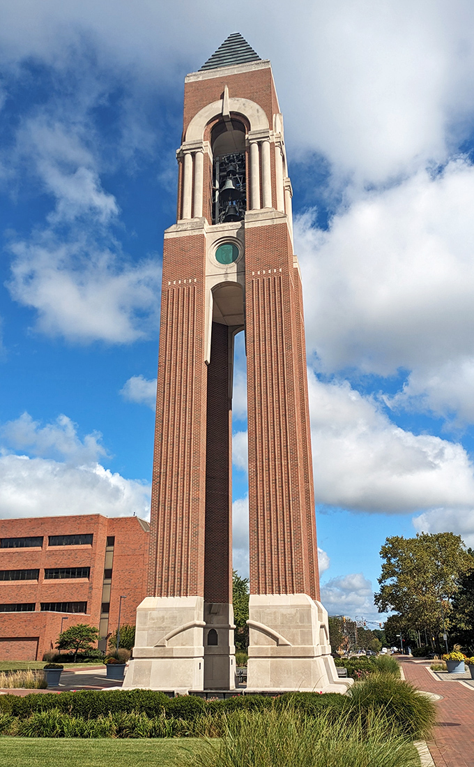 Shafer Tower reaches skyward at Ball State University, a brick-and-mortar exclamation point on campus. Even the clouds seem to pause for a look.