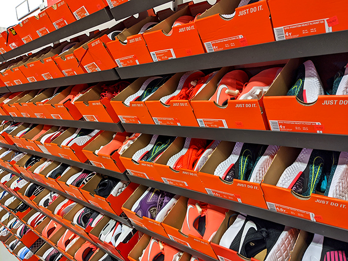 Nike's orange boxes create a wall of athletic potential &ndash; each pair inside whispering, "Maybe these are the shoes that will finally get you running."