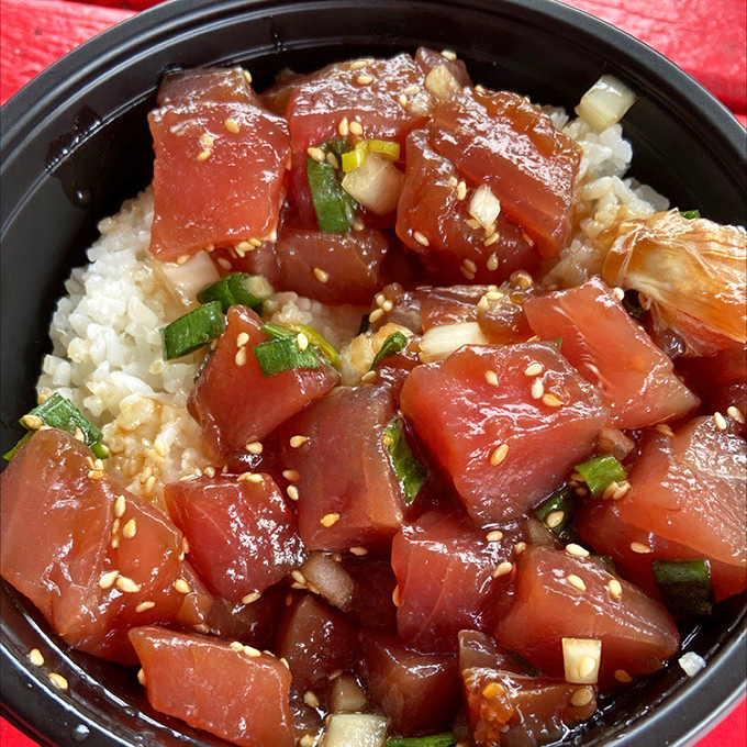 Ruby-red chunks of ahi tuna in shoyu sauce, where every bite whispers secrets of the Pacific.