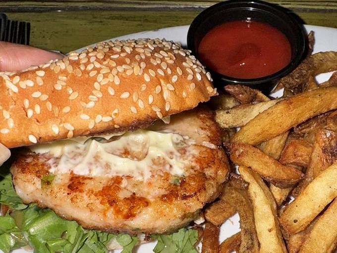 This isn't just a burger; it's a seafood revelation on a bun, with hand-cut fries that deserve their own fan club.