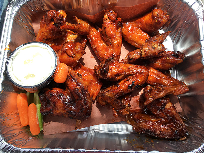 Wings that have graduated from sports bar appetizer to barbecue royalty. That sticky glaze is practically begging to be on your fingers.