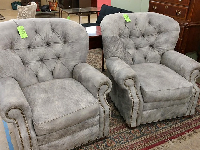 These plush gray armchairs aren't just furniture; they're time machines waiting to transport you to evenings of reading and reminiscing.
