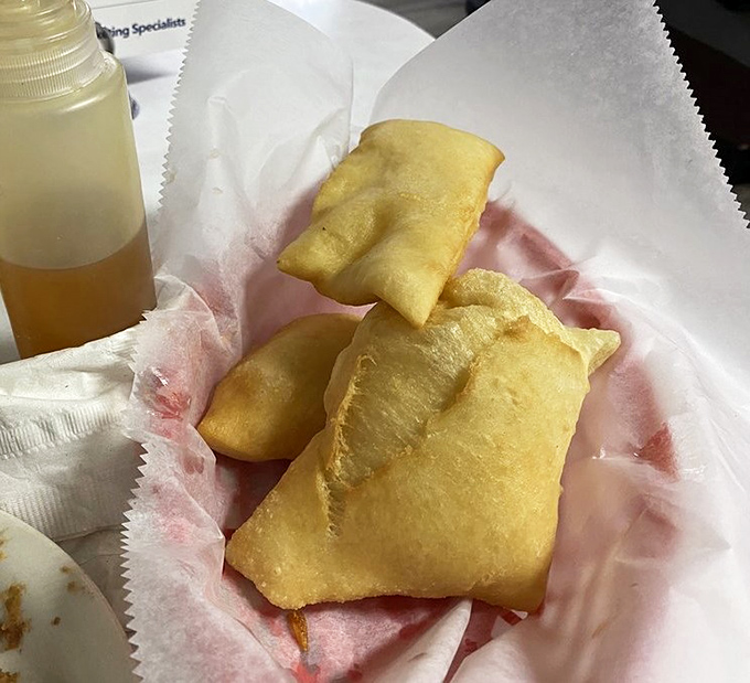 Golden-fried sopapillas that puff up with such dramatic flair, they deserve their own standing ovation. Crispy outside, pillowy inside – the perfect edible envelope.