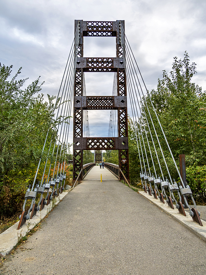 This suspension bridge isn't just functional&mdash;it's an Instagram moment waiting to happen, connecting the town's past with its present in dramatic fashion.