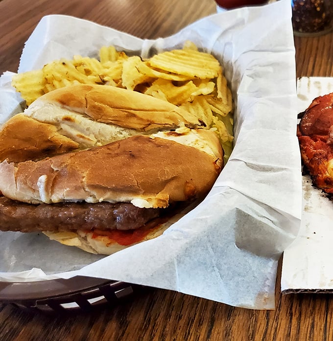This isn't just a sandwich; it's an engineering marvel of meat, bread, and chips that somehow manages to stay together until that first glorious bite.
