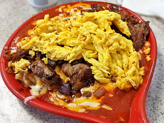 This hearty skillet doesn't just break your fast&mdash;it demolishes it with eggs, meat, and that signature New Mexican red chile sauce.