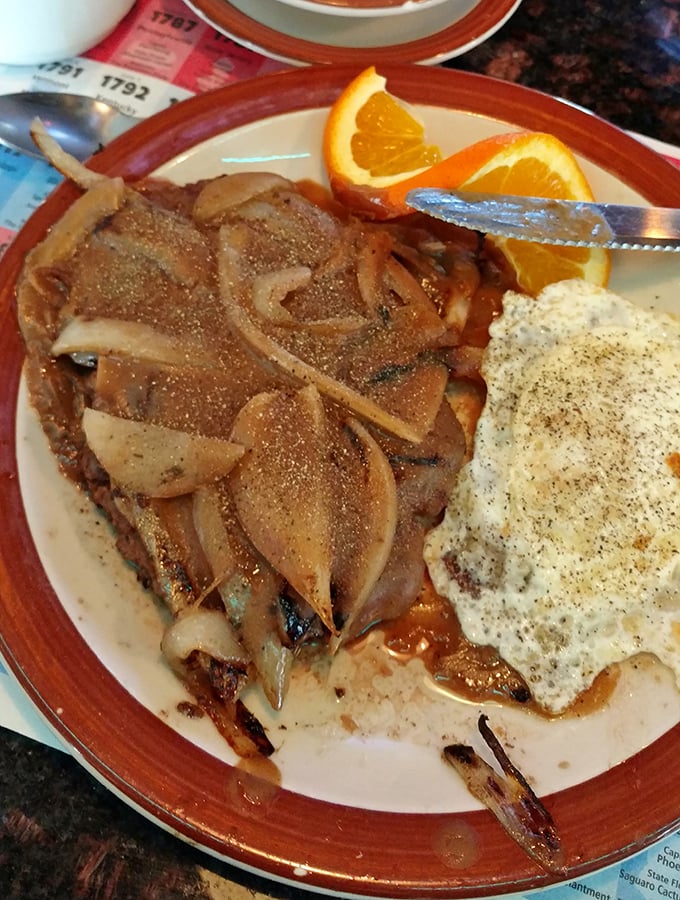 Steak and eggs: the breakfast of champions and anyone who plans to skip lunch. Those caramelized onions are doing a victory lap.