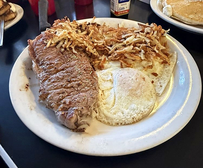 The classic steak and eggs with crispy hash browns&mdash;a breakfast combination that's survived every food trend since your grandparents' first date.