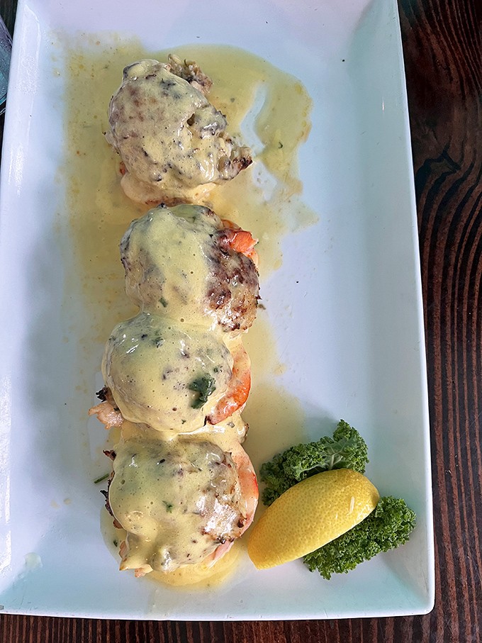 These stuffed shrimp swimming in key lime butter sauce aren't just a meal &ndash; they're a religious experience with a lemon garnish.