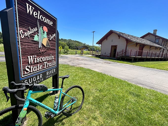 The Sugar River State Trail sign stands as a beacon for cyclists seeking scenic routes through Wisconsin's rolling countryside. Adventure awaits just beyond.