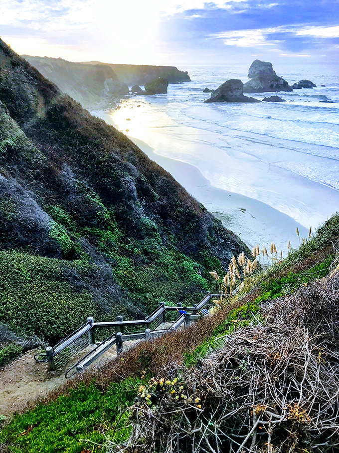 Dawn's misty curtain slowly rises on nature's greatest show. The marine layer parts just enough to reveal Big Sur's dramatic coastline.