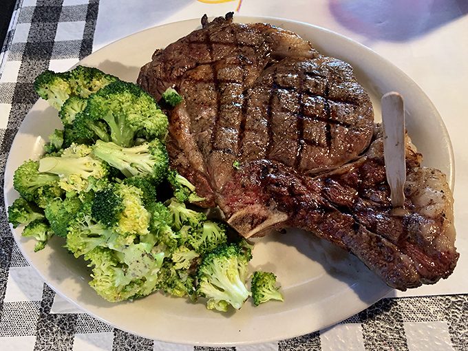This isn't just a steak—it's a masterclass in flame-kissed perfection, with those crosshatch grill marks deserving their own Instagram account.