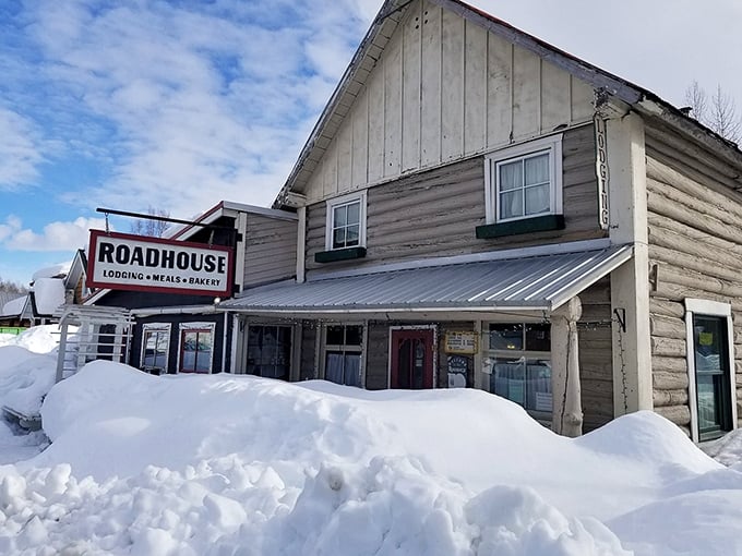 Winter transforms the Roadhouse into a snow-framed postcard, promising warm sourdough pancakes inside that could double as emergency blankets.