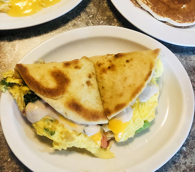 The Tandoori Breakfast Sandwich proves that even in small-town Ohio, culinary borders are meant to be deliciously crossed. Global flavors meet hometown comfort.