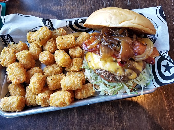Golden-brown tater tots that crunch like your favorite childhood memory, paired with a burger that reminds you being grown-up has its perks.