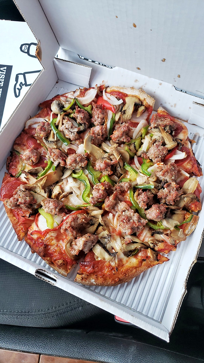 The Terita's Special isn't just a pizza, it's a flavor summit where sausage, mushrooms, peppers, and onions achieve delicious harmony.