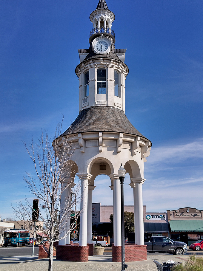 The Cone & Kimball Tower stands like a Victorian lighthouse in a sea of modernity, its clock keeping time for generations of Red Bluff residents.