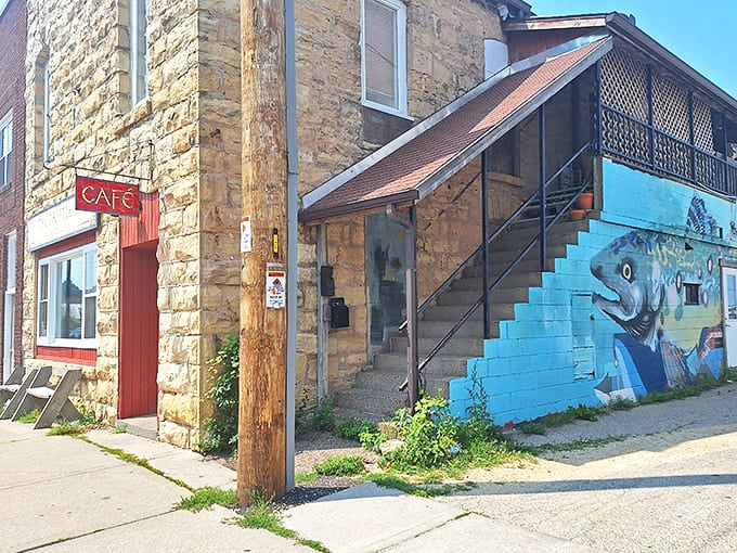 This unassuming stone caf&eacute; might not look Instagram-famous, but locals know the fish mural outside hints at the culinary treasures waiting within.