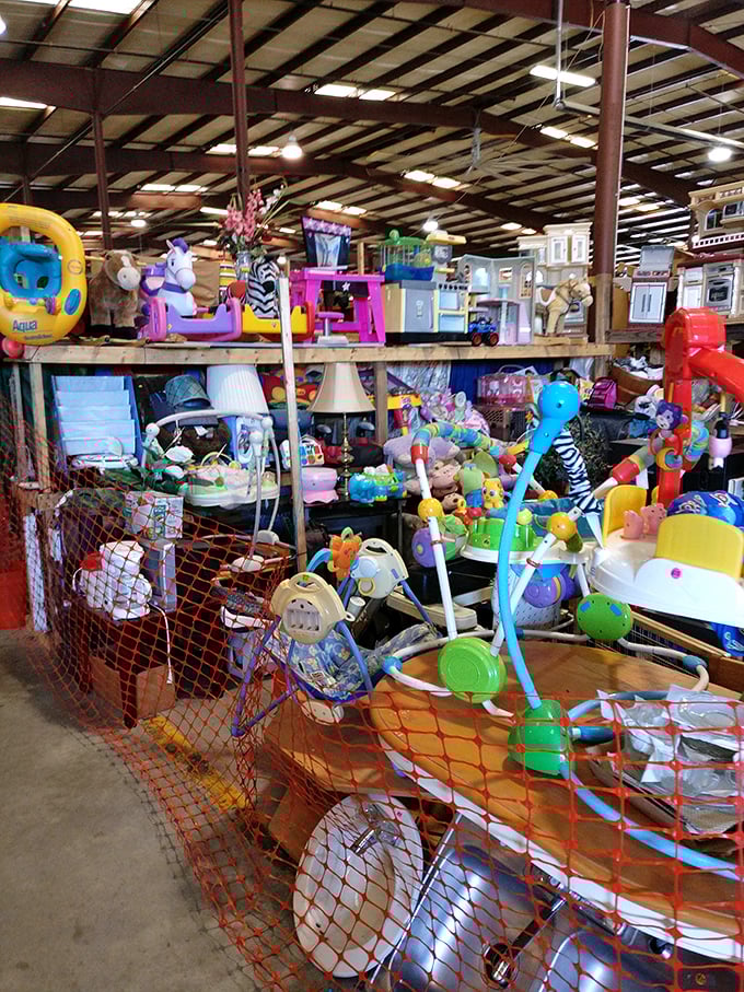 Childhood nostalgia explodes in this toy corner—like someone raided your memory bank and displayed it behind safety netting for the next generation.