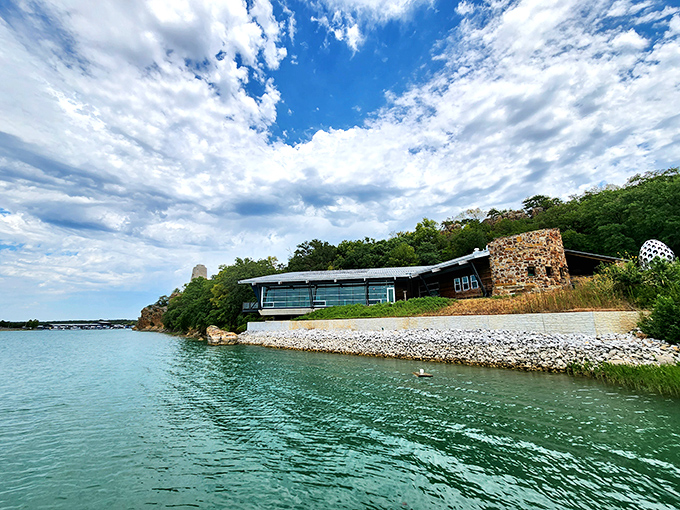 Stone meets water at Tucker Tower, where mid-century architecture embraces nature's canvas&mdash;like Frank Lloyd Wright decided to vacation in Oklahoma.