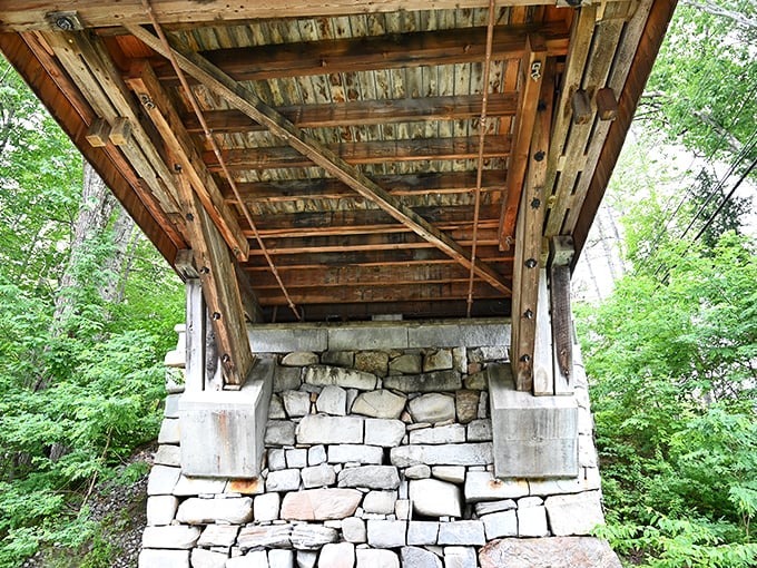 Beneath the bridge, masterful stonework supports generations of crossings&mdash;a foundation as solid as New Hampshire itself.