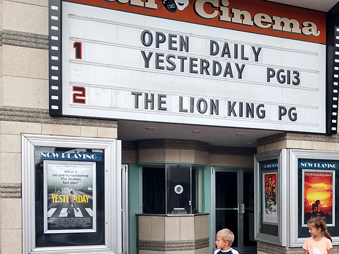 The Vali Twin Cinema marquee takes you back to when movie nights were community events, not just streaming options on your couch.