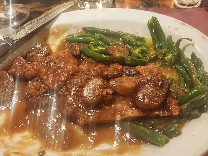 When veal and green beans get together with this much sauce, it's not just a meal – it's a delicious conspiracy against your diet.