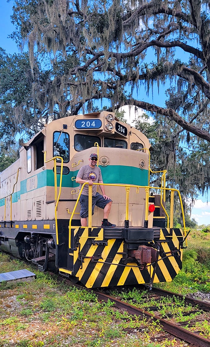 Locomotive No. 204 stands as a testament to American engineering, its cream and teal livery gleaming under Spanish moss and Florida sunshine.
