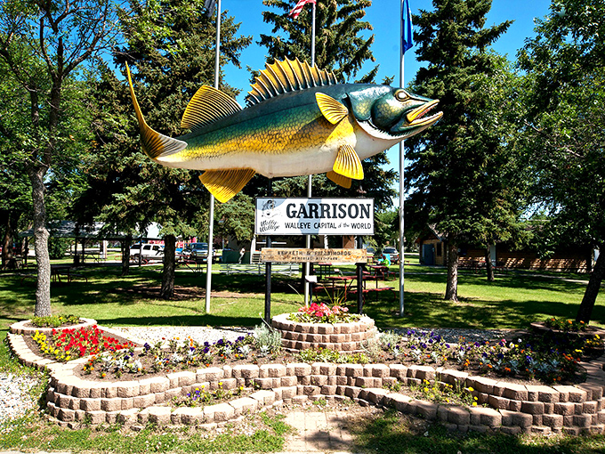 Wally the Walleye stands proud, declaring Garrison's fishing credentials louder than any chamber of commerce brochure could. 