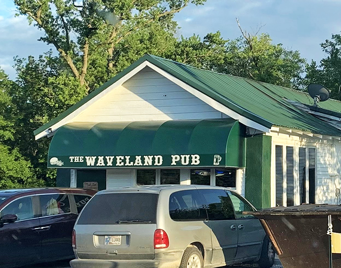 The Waveland Pub's green awning beckons like an oasis in a desert&mdash;except instead of water, they're serving something much more fun.