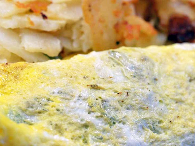 This Western omelet has more fillings than your last dental appointment, but infinitely more enjoyable. Home fries looking equally spectacular.