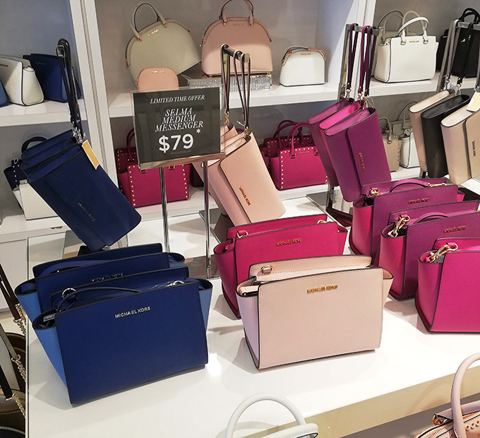 Michael Kors handbags in a rainbow of possibilities. Your credit card may weep, but your shoulder will look magnificent.