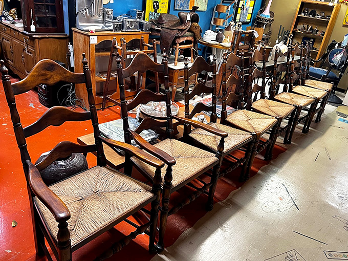 A lineup of vintage chairs that have witnessed more family dinners than Thanksgiving at your aunt's house.