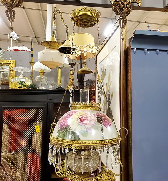 Victorian elegance hangs overhead, proving our ancestors knew how to make lighting fixtures worthy of dinner conversation.