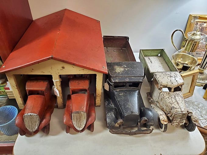 Tiny trucks with original paint tell tales of Christmas mornings past. Before batteries required, imagination powered these beauties.