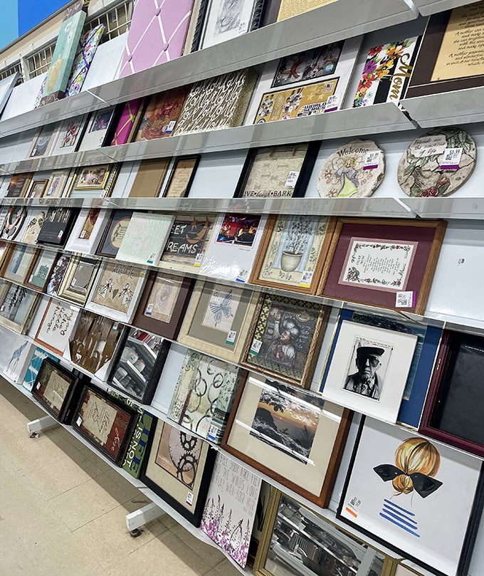 Wall art galore! From inspirational quotes to mysterious landscapes, someone's discarded decor becomes your conversation starter.