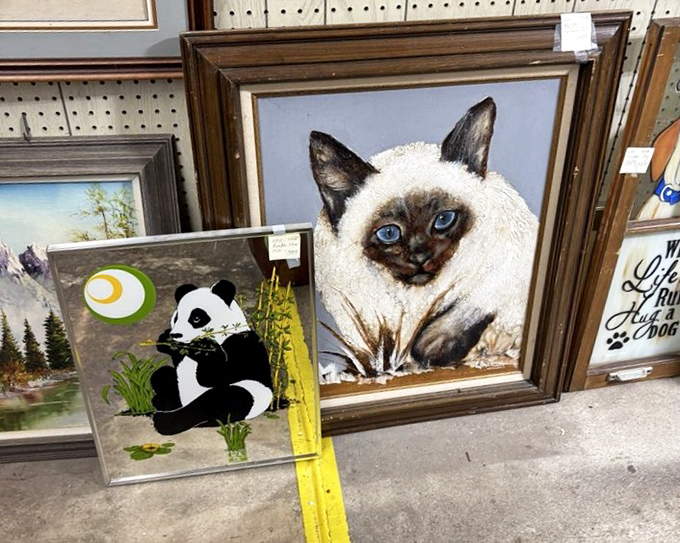 Even the art has personality here &ndash; from contemplative Siamese cats to bamboo-munching pandas, there's a painting for every blank wall.