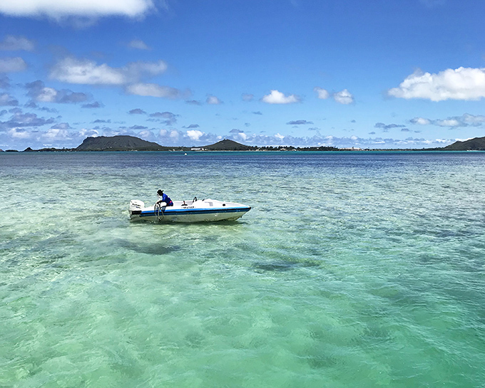 Water so clear the boat looks Photoshopped, floating over turquoise that redefines your understanding of blue.