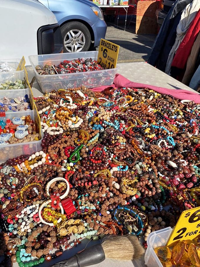 Beaded treasures cascade across tables like edible candy. Each bracelet tells a story, though your wrist can only wear so many chapters.