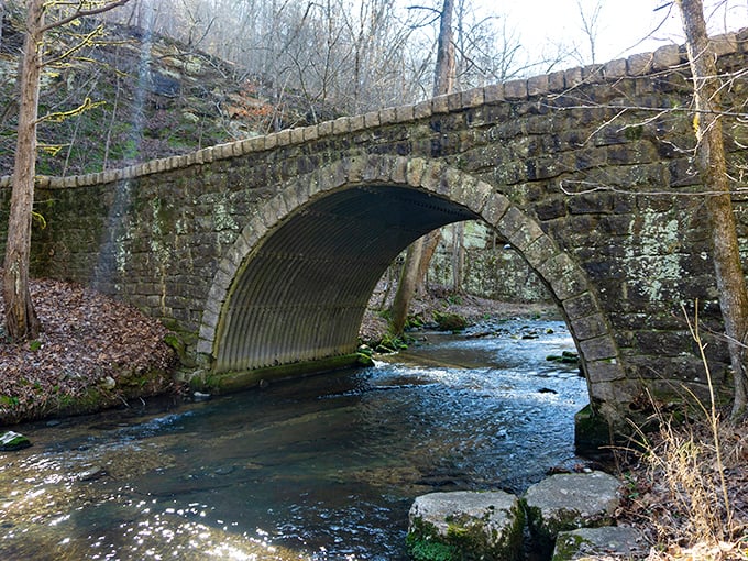 Not all bridges are created equal. This stone arch doesn't just connect two sides &ndash; it creates a perfect frame for the flowing stream below.