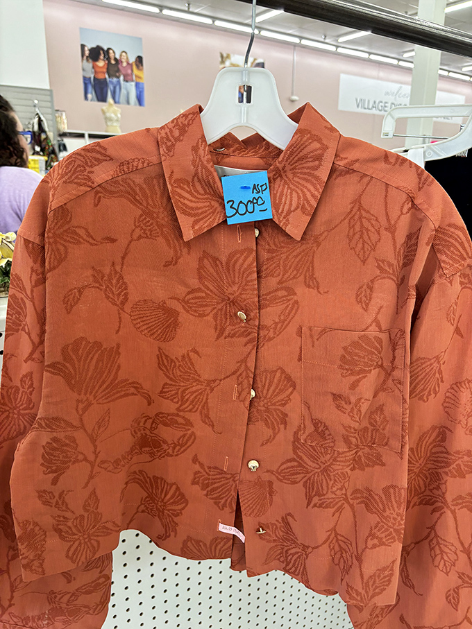 That perfect burnt-orange button-down with subtle floral embossing&mdash;someone's donation becomes your "Where did you find that?" conversation starter.