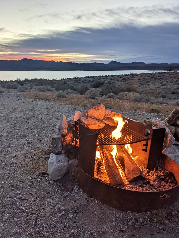 Campfire therapy with a lake view prescription. Nothing heals the soul quite like flames dancing while the sun sets over Alamo's waters.