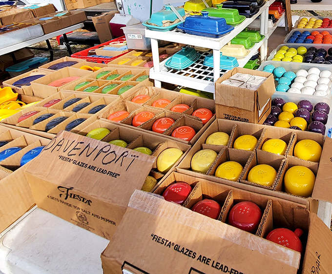 Fiestaware heaven! These vibrant ceramics aren't just dishes&mdash;they're time capsules of American dining, stacked neatly in cardboard time machines.